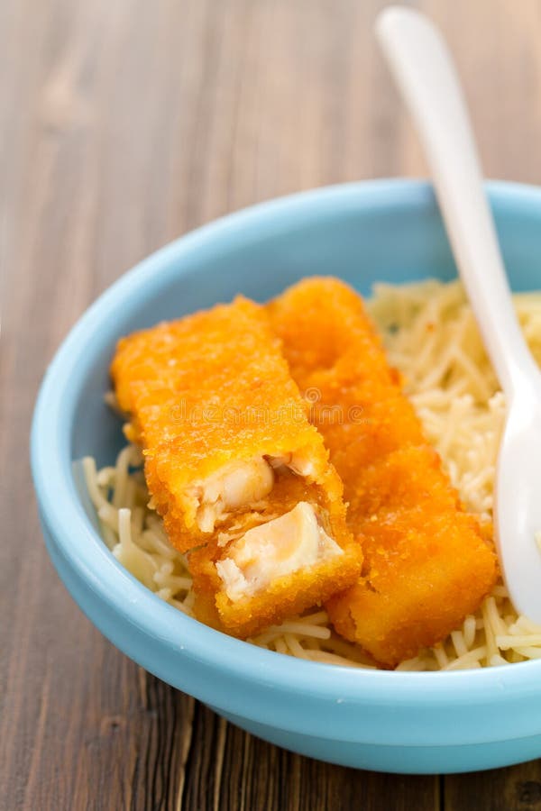 Fish Sticks with Pasta in Blue Bowl Stock Photo - Image of health ...