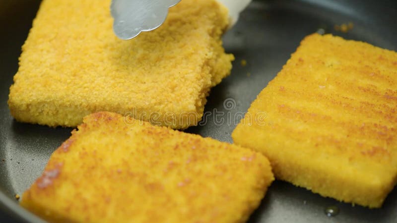 Fish Sticks. the Process of Cooking Fish Sticks in a Pan, Close-up ...