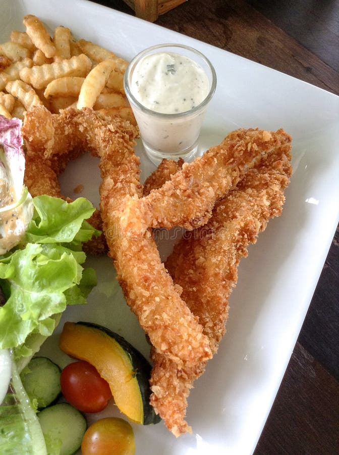Fish Sticks with Vegetables on a White Plate Stock Photo - Image of ...