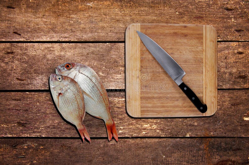 Fish on the table stock photo. Image of ocean, chef - 106777664
