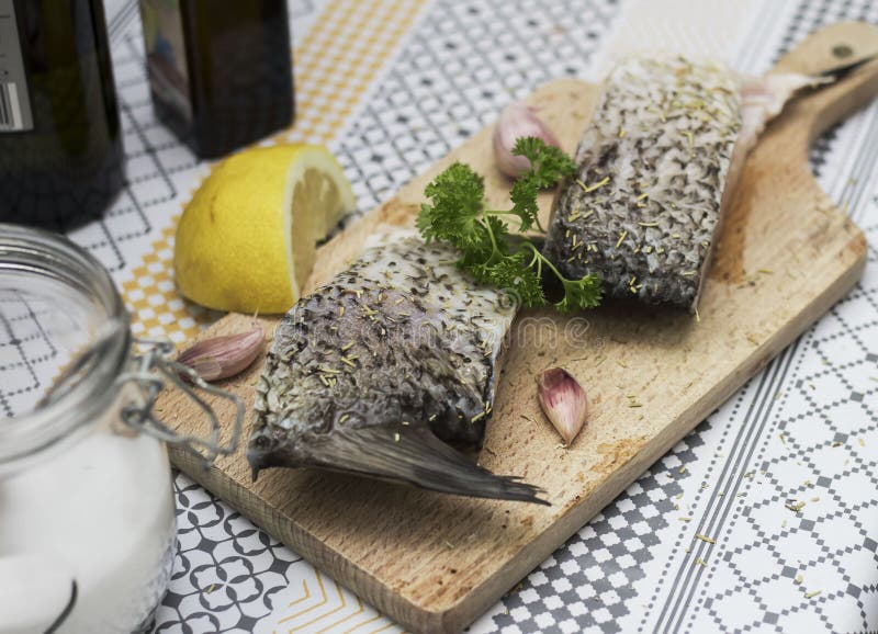 Fish on the table stock image. Image of salt, board - 190049009