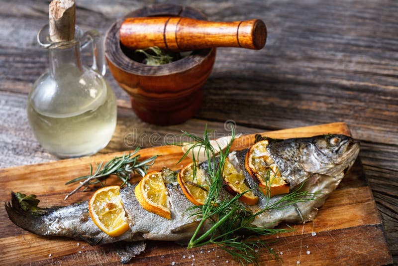 Fish on Table with Fresh Ingredients for Cooking Stock Photo - Image of ...