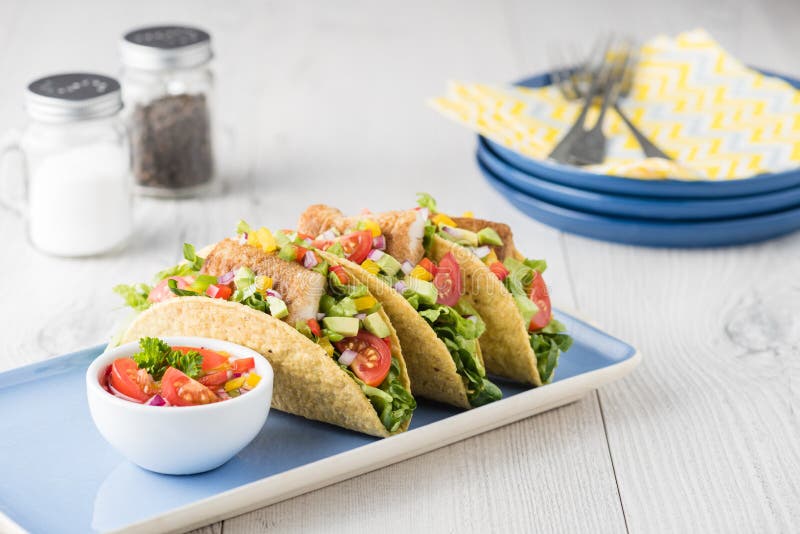 Fish Tacos Shell with Avocado Salsa Stock Photo - Image of dips, cheese ...