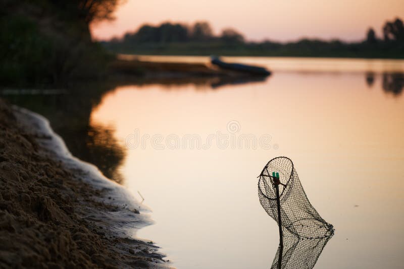 A Fish Tank on the River Bank in the Evening Stock Photo - Image of ...