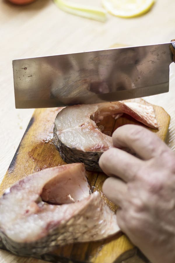 Fish. There is a Raw Fish Cut into Pieces on the Kitchen Board Stock ...