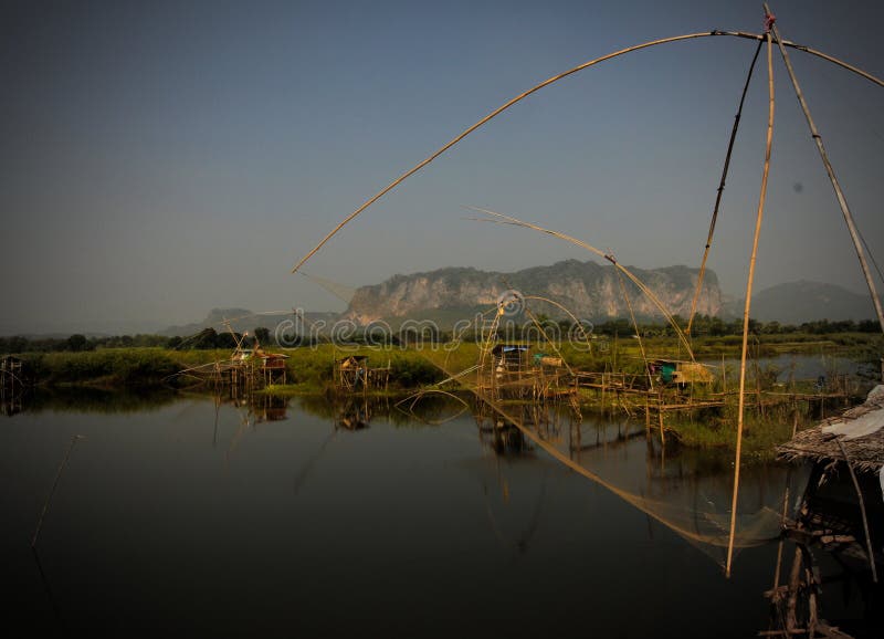 Fish traps stock image. Image of pond, mountain, river - 310478691