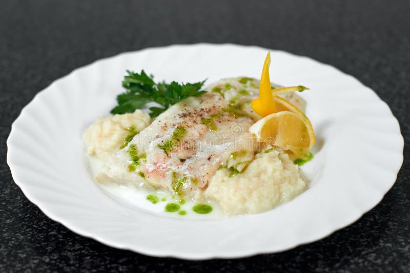 Fish with vegetable puree stock photo. Image of plate - 223582396