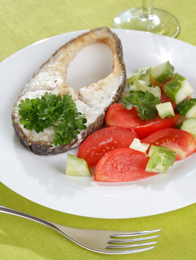 Fish with vegetables stock image. Image of dining, dish - 10604449
