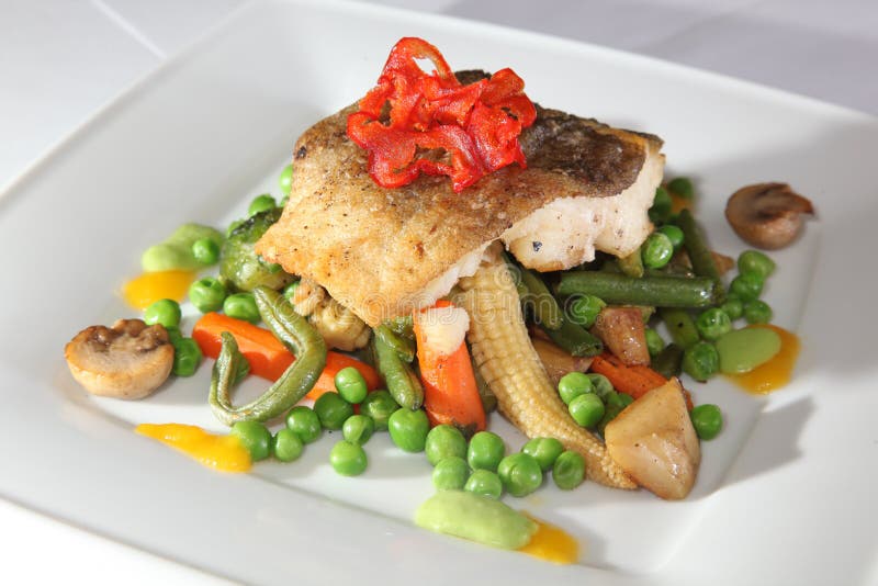 Fish with vegetables stock image. Image of restaurant - 11664415