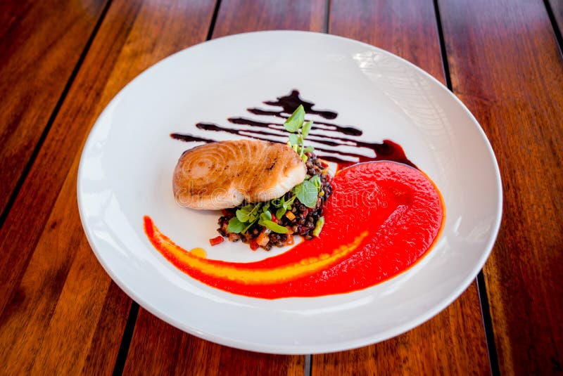 Fish with Vegetables on a White Plate. Restaurant. Stock Image - Image ...