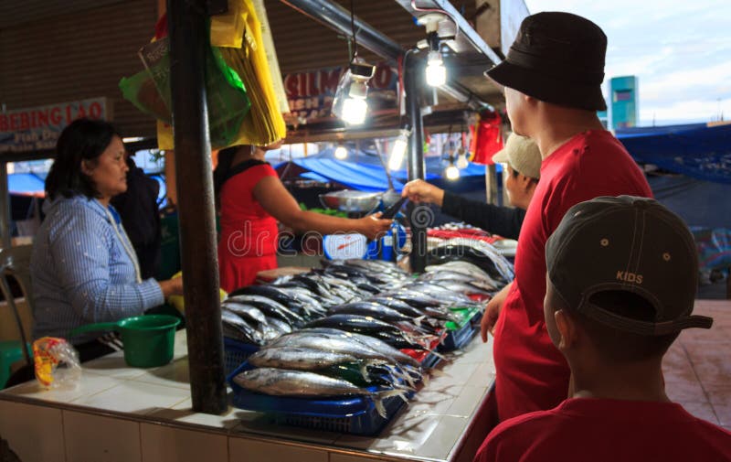 A Fish Vendor Sells Fresh Fishes at Fish Port and Public Market ...