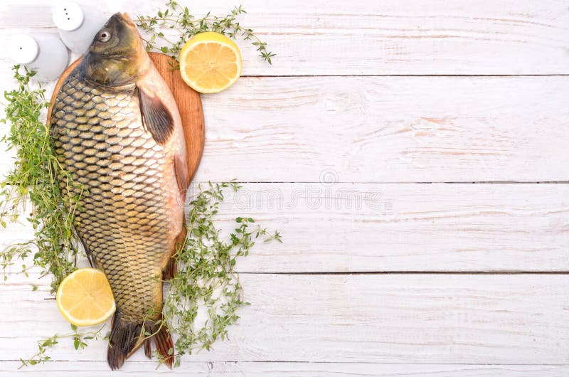 Fish on a White Wooden Table. Stock Image - Image of food, cooking ...