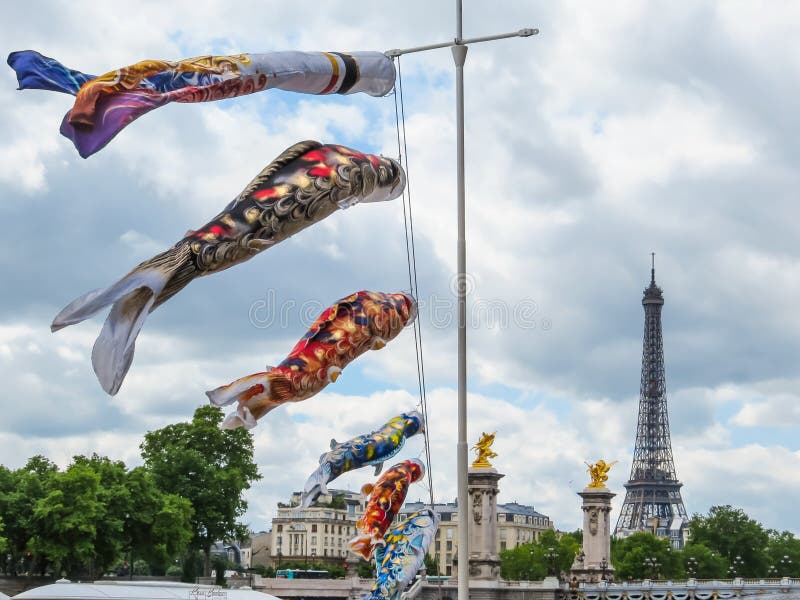 Fish Windsock or Fish Flag and Eiffel Tower Stock Photo - Image of ...
