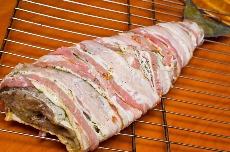 Fish wrapped in bacon stock image. Image of pork, trout - 31418585