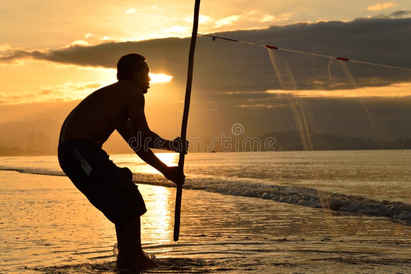 Fisher catching fish editorial stock image. Image of evening - 32442614
