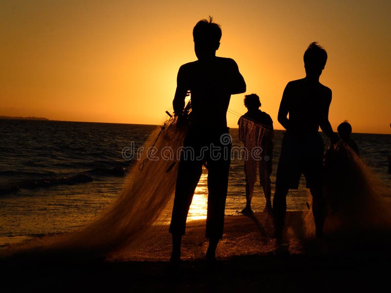 Fisher catching fish editorial photo. Image of sunlight - 32436476