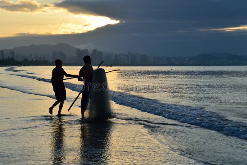 Fisher catching fish editorial stock photo. Image of dawn - 32442613