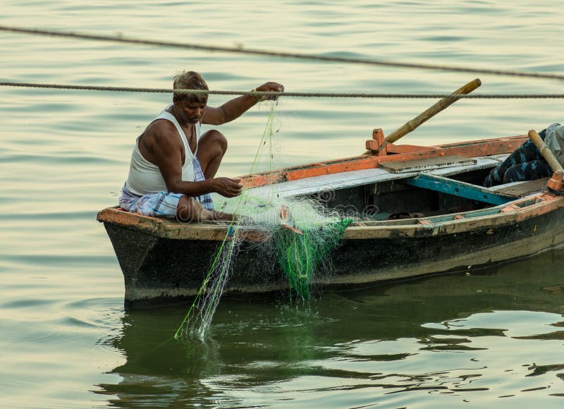 Fisher Man Catching Fish in River Editorial Image - Image of fish ...