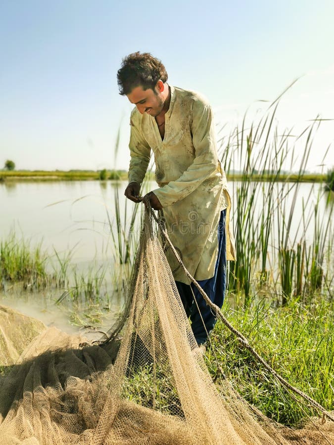 Fisher Men are Catching Fish by New Stock Image - Image of beach ...