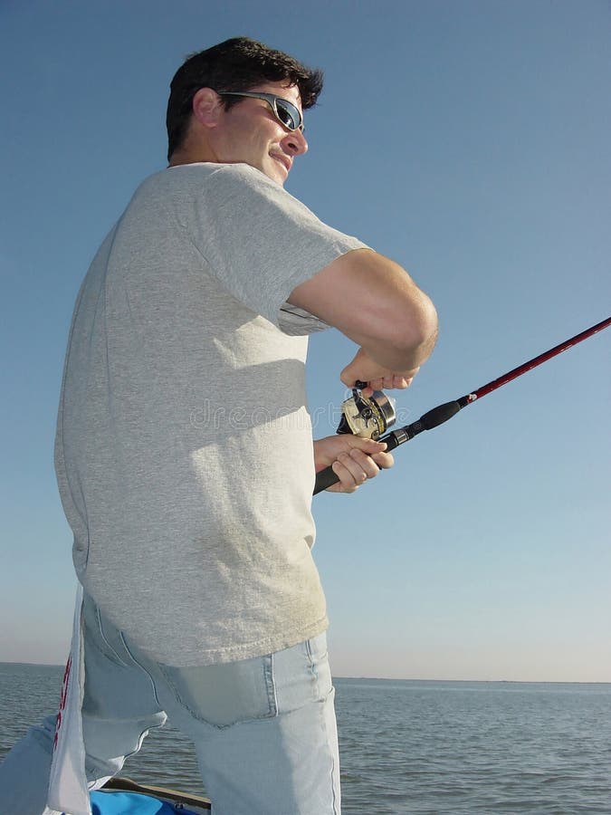 Angler Fisherman Fighting Big Fish Rod and Reel Stock Photo - Image of ...