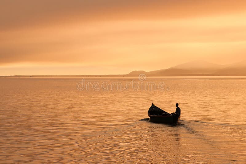 Fisherman Alone on His Boat Stock Photo - Image of boat, america: 19238292