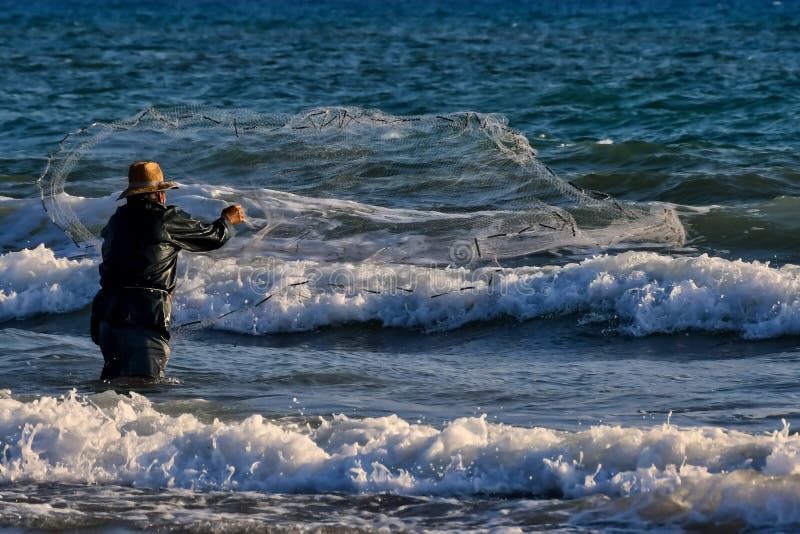 Fisherman Casting Net during Daylight in Delta of the River Alpheios in ...