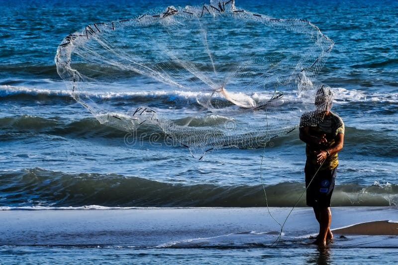 Fisherman Casting Net during Daylight in Delta of the River Alpheios in ...