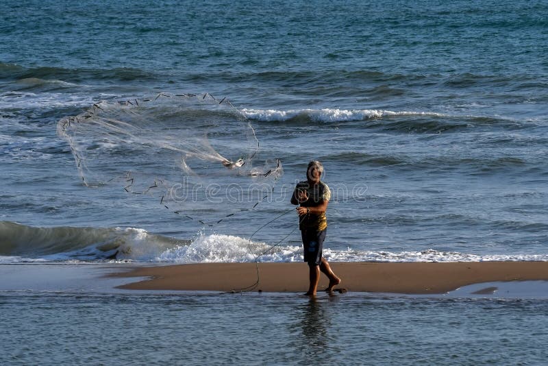 Fisherman Casting Net during Daylight in Delta of the River Alpheios in ...