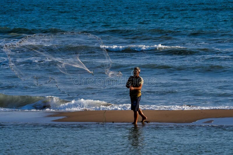 Fisherman Casting Net during Daylight in Delta of the River Alpheios in ...