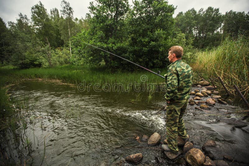 Fisherman Catching Fish on the River. Nature. Stock Photo - Image of ...