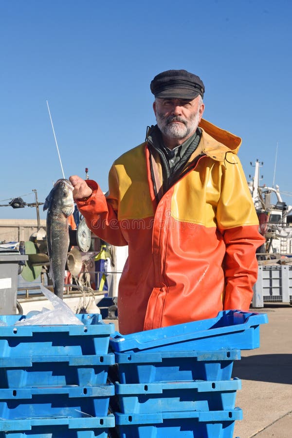 A Fisherman with a Fish Box Inside a Fishing Boat Stock Image - Image ...