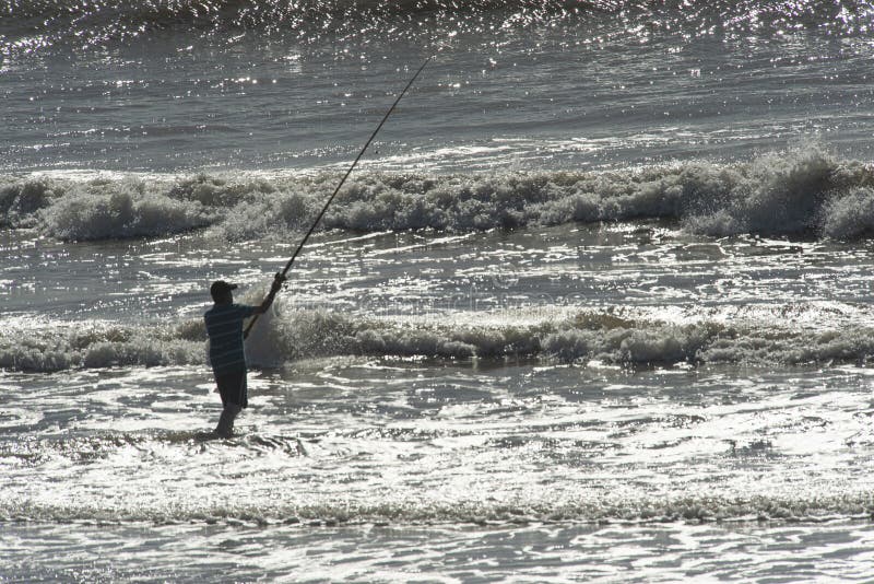 Fisherman Fishing on the Beach Big Waves Editorial Image - Image of ...