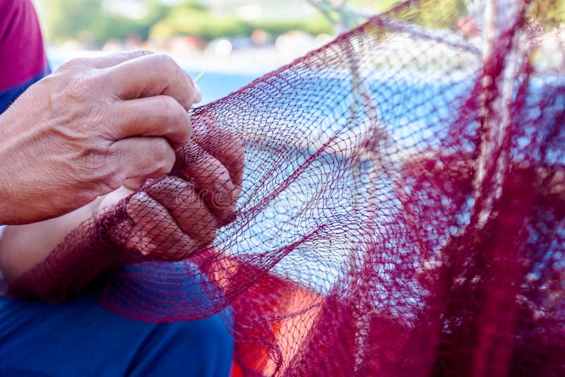 Fisherman is Fixing the Fish Net Stock Image - Image of fish, fishing ...