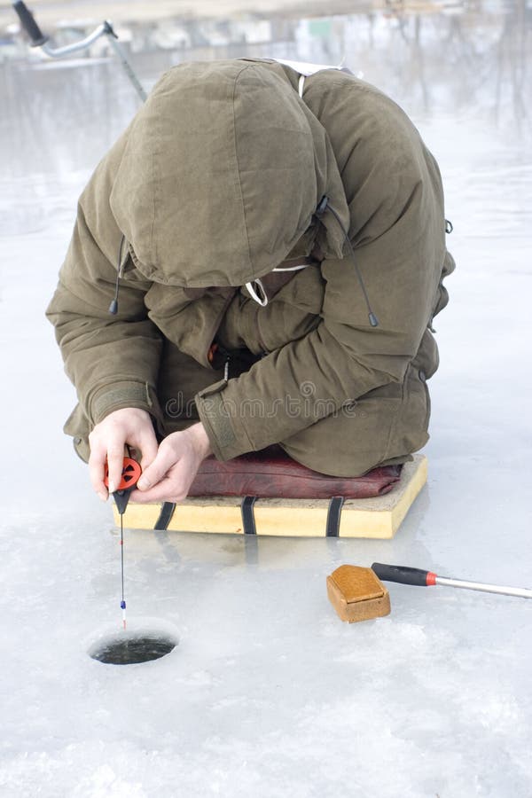 Ice Fishing on the Lake stock photo. Image of canada - 13497436