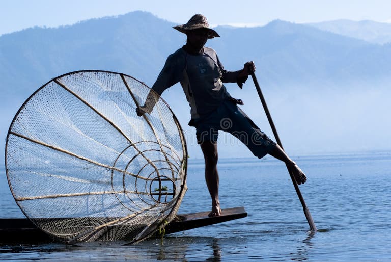 Fisherman on Inle Lake editorial stock image. Image of silhouette ...