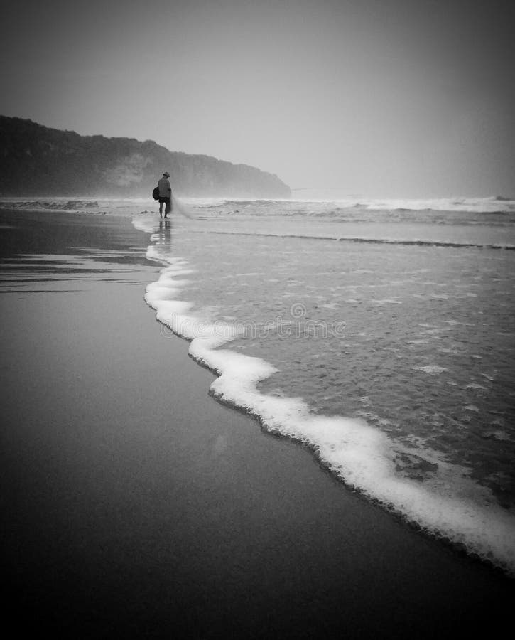 Fisherman on the Line Beach Stock Image - Image of line, light: 193514613
