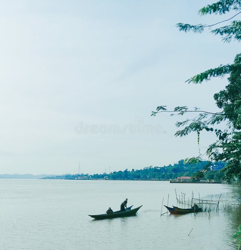 Fisherman Looking for Fish in the River on Sunny Morning Stock Image ...