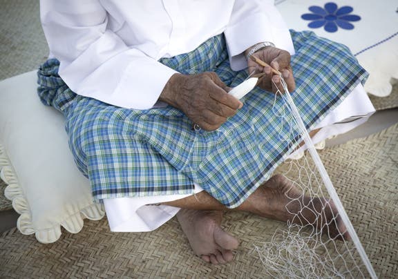 Fisherman making nets stock photo. Image of qasr, palace - 167255178