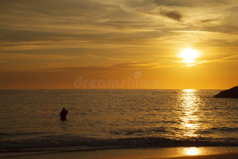 Fisherman on Mwnt editorial stock image. Image of casting - 84616629