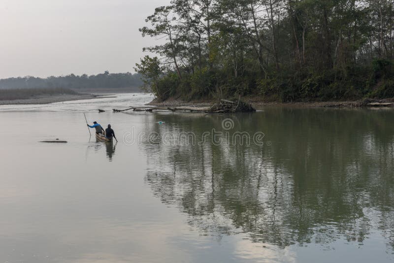 Fisherman at Rapti River of Chitwan National Park in Nepal Stock Photo ...