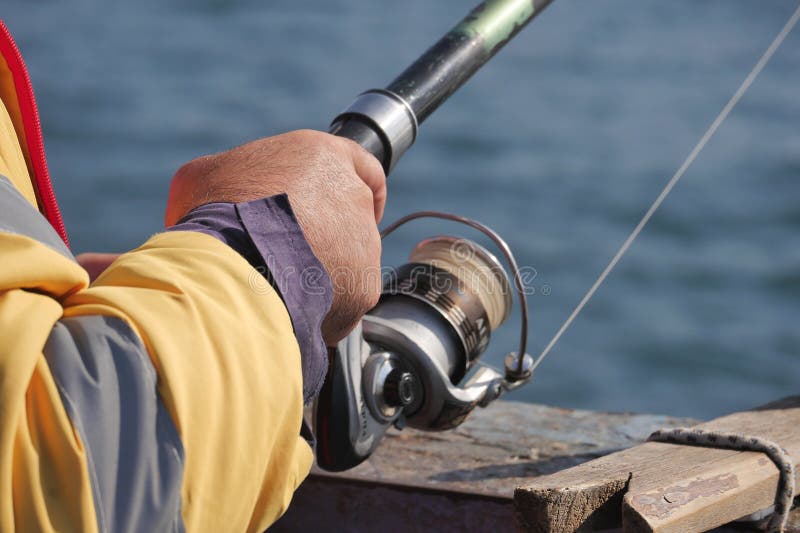 Fisherman with Rod, Spinning Reel , Stock Photo - Image of catch ...