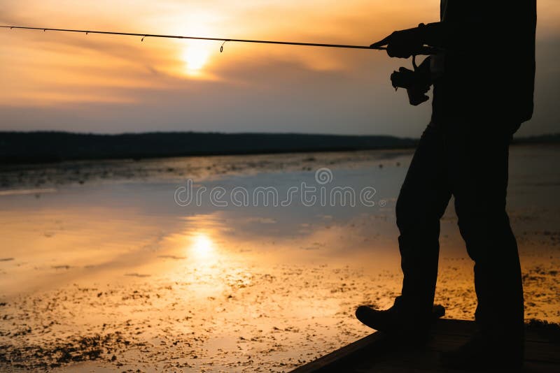 The Fisherman S Hands, Holds the Spinning Rod, Rotates the Coil Handle ...