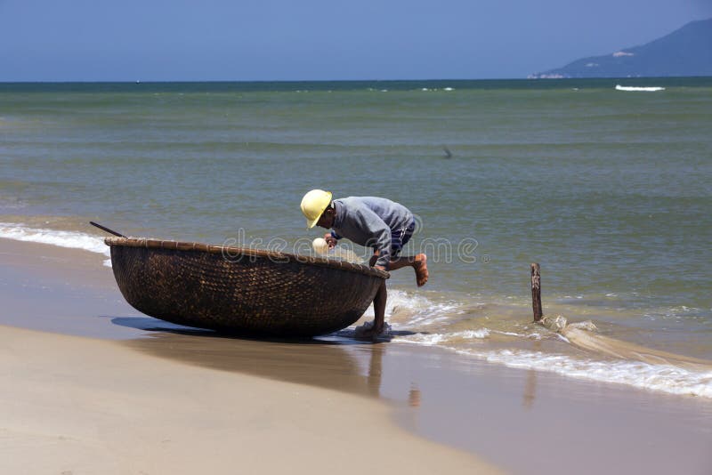 A fisherman in a shell editorial photography. Image of boat - 70494627