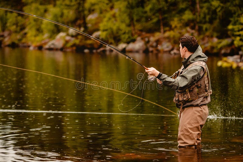 Fisherman Using Rod Fly Fishing in Mountain River Stock Image - Image ...