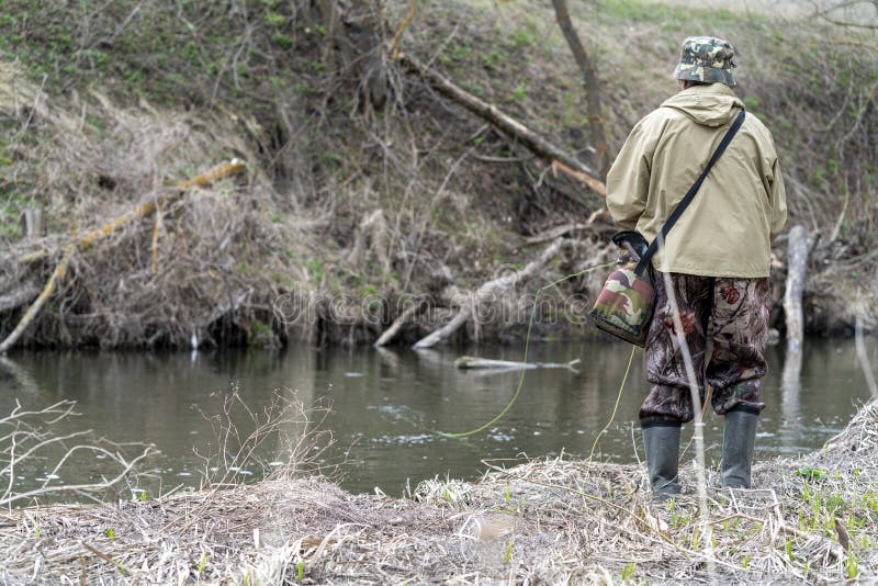 Fisherman Using Rod Fly Fishing in Mountain River. Stock Image - Image ...