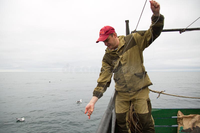 Fisherman at Work, Sea of Okhotsk. Stock Photo - Image of river, person ...