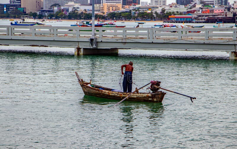 A Fisherman at Work by the Sea Editorial Stock Photo - Image of city ...