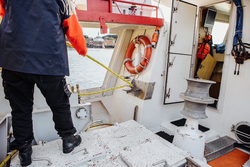 The Fisherman Works with the Rigging Stock Image - Image of vessel ...
