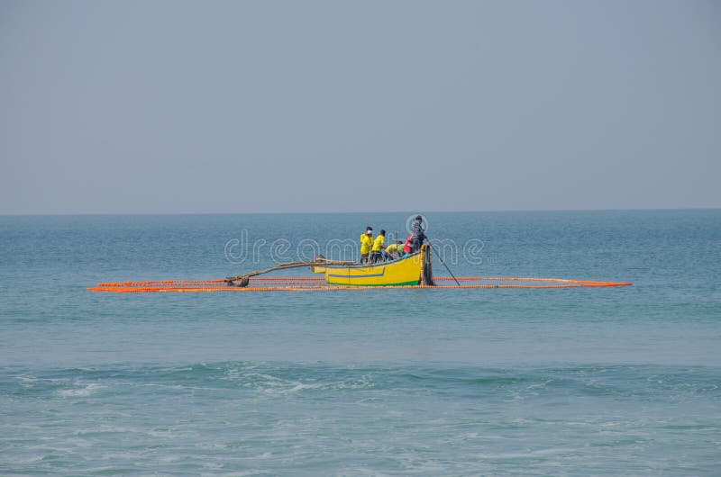 Fishermen by the Boat Catch Fish in the Sea Editorial Stock Image ...