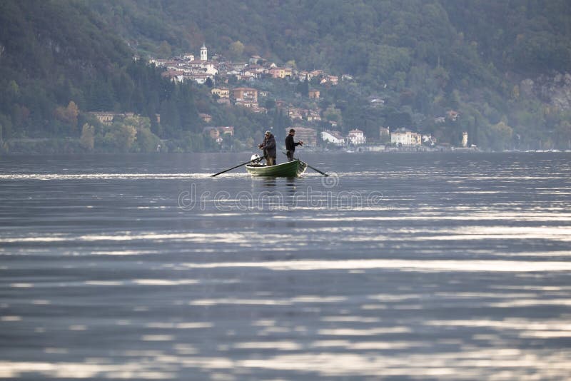 Fishermen on a Boat Fishing Near the Shore Editorial Stock Image ...